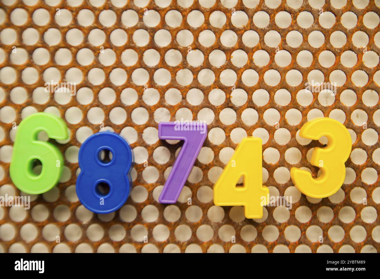 Series of letters and numbers on white base metal Stock Photo - Alamy