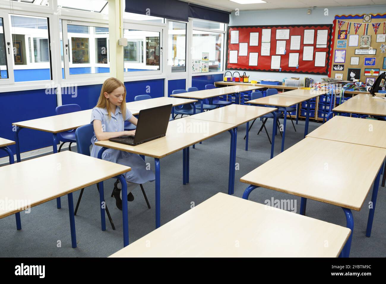 In school children using laptops hi-res stock photography and images ...