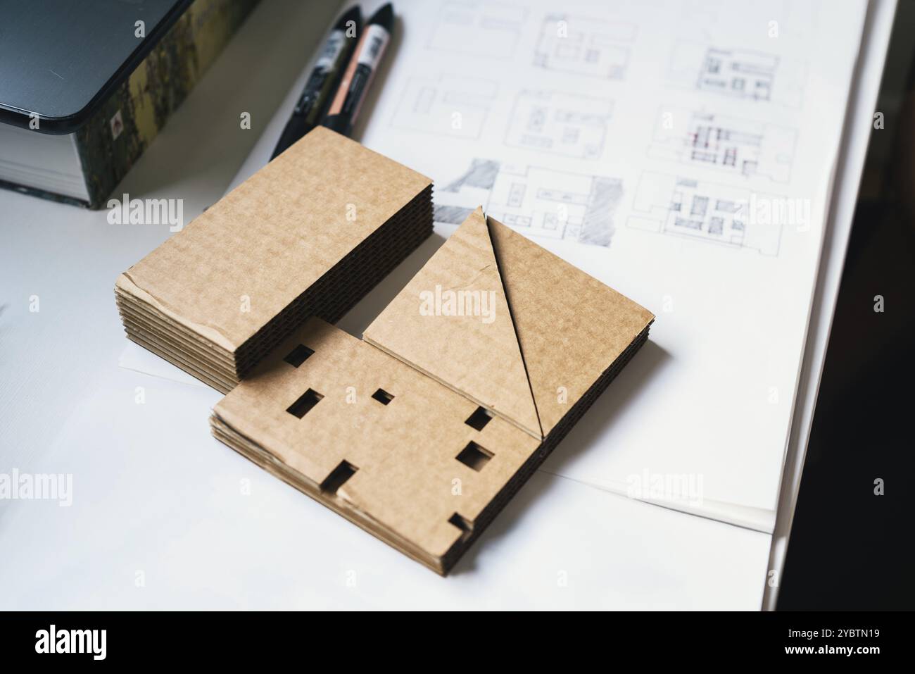 Architect Desk With Cardboard Architectural Model and Hand-drawn Plan ...