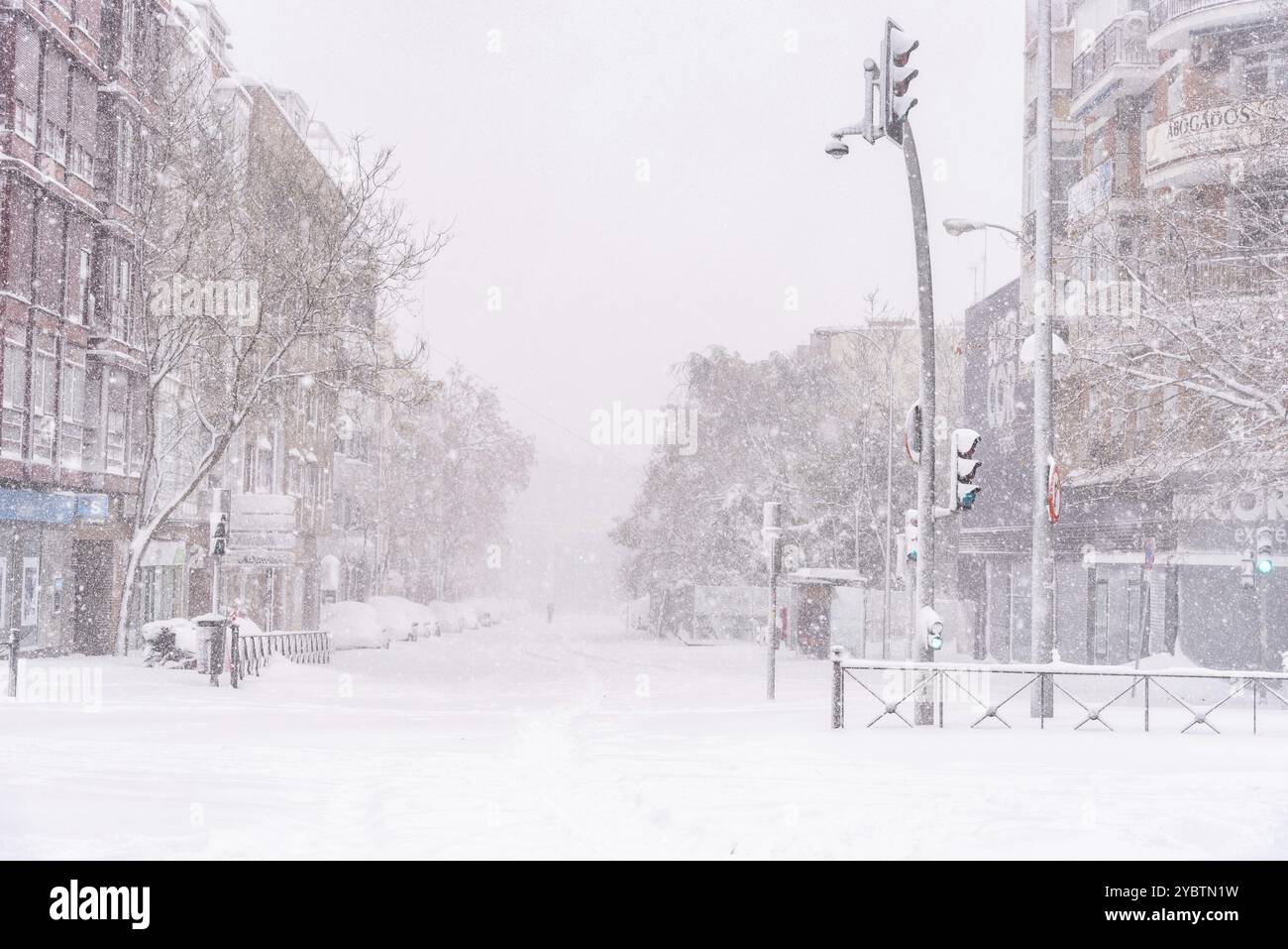 Madrid, Spain, January 9, 2021: View of a stree of the covered in snow ...