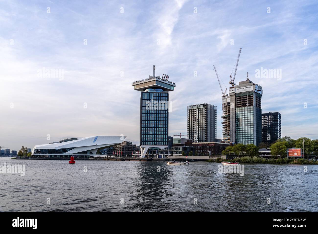 Amsterdam, Netherlands, May 6, 2022: Scenic view at sunset of the IJ ...