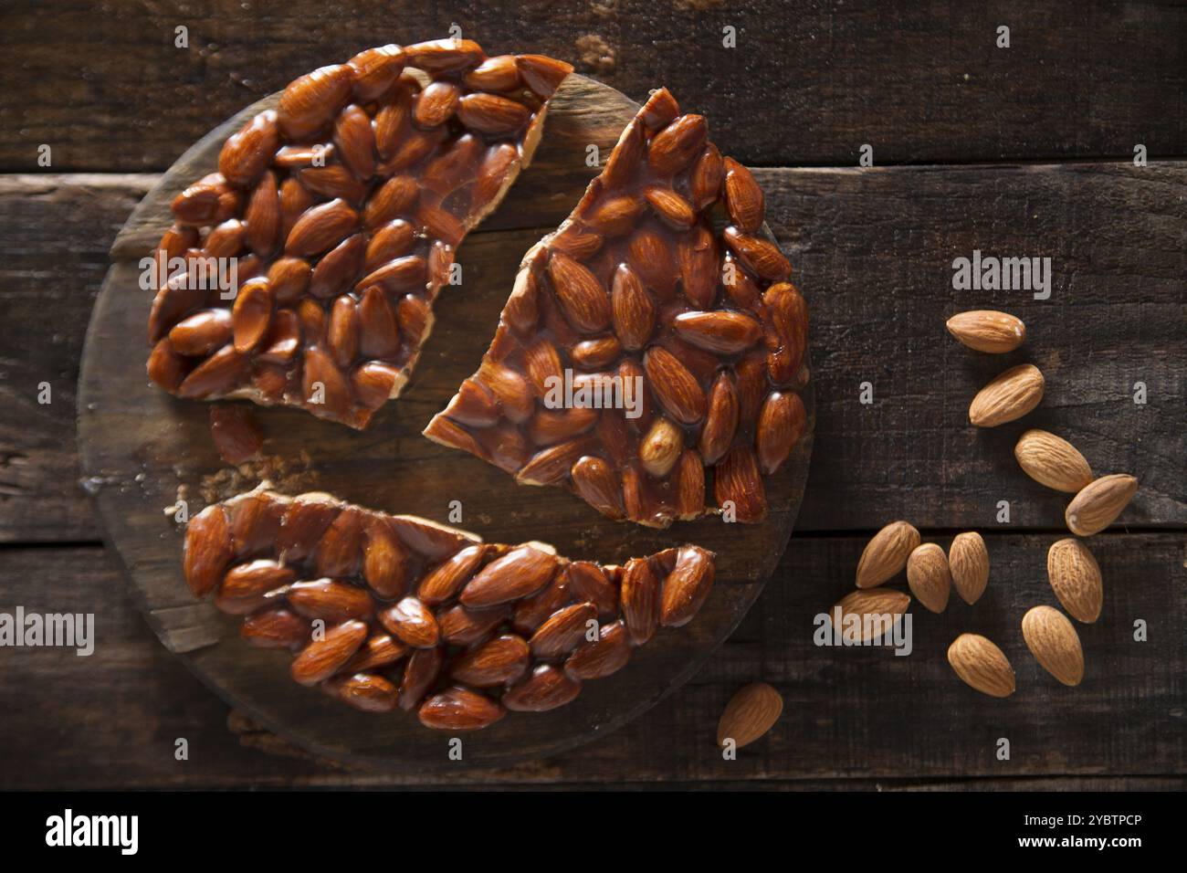 Typical and traditional sweet made from melted sugar and almonds Stock ...