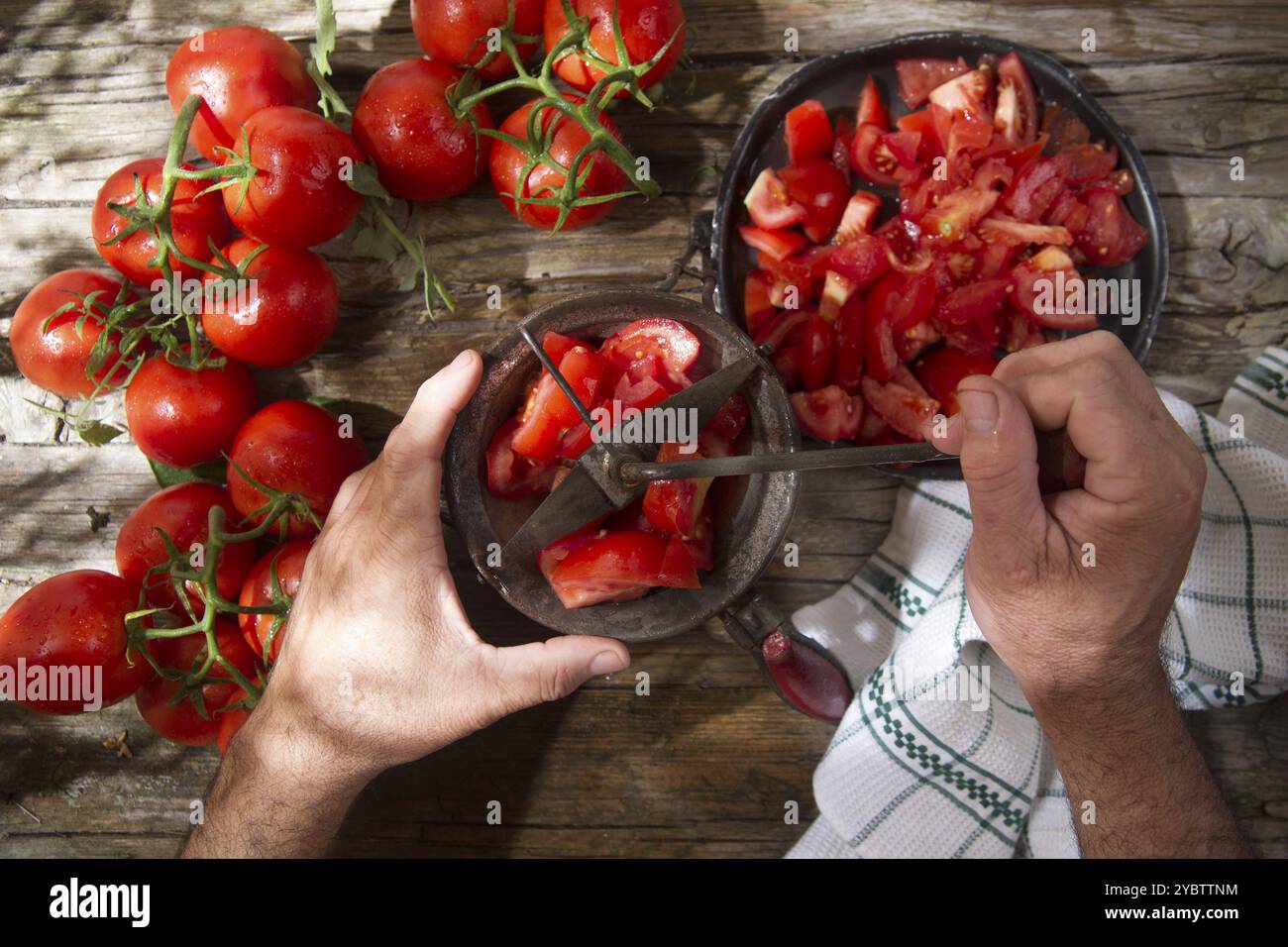 Preparation with strainer preserve fresh smooth round tomato Stock ...