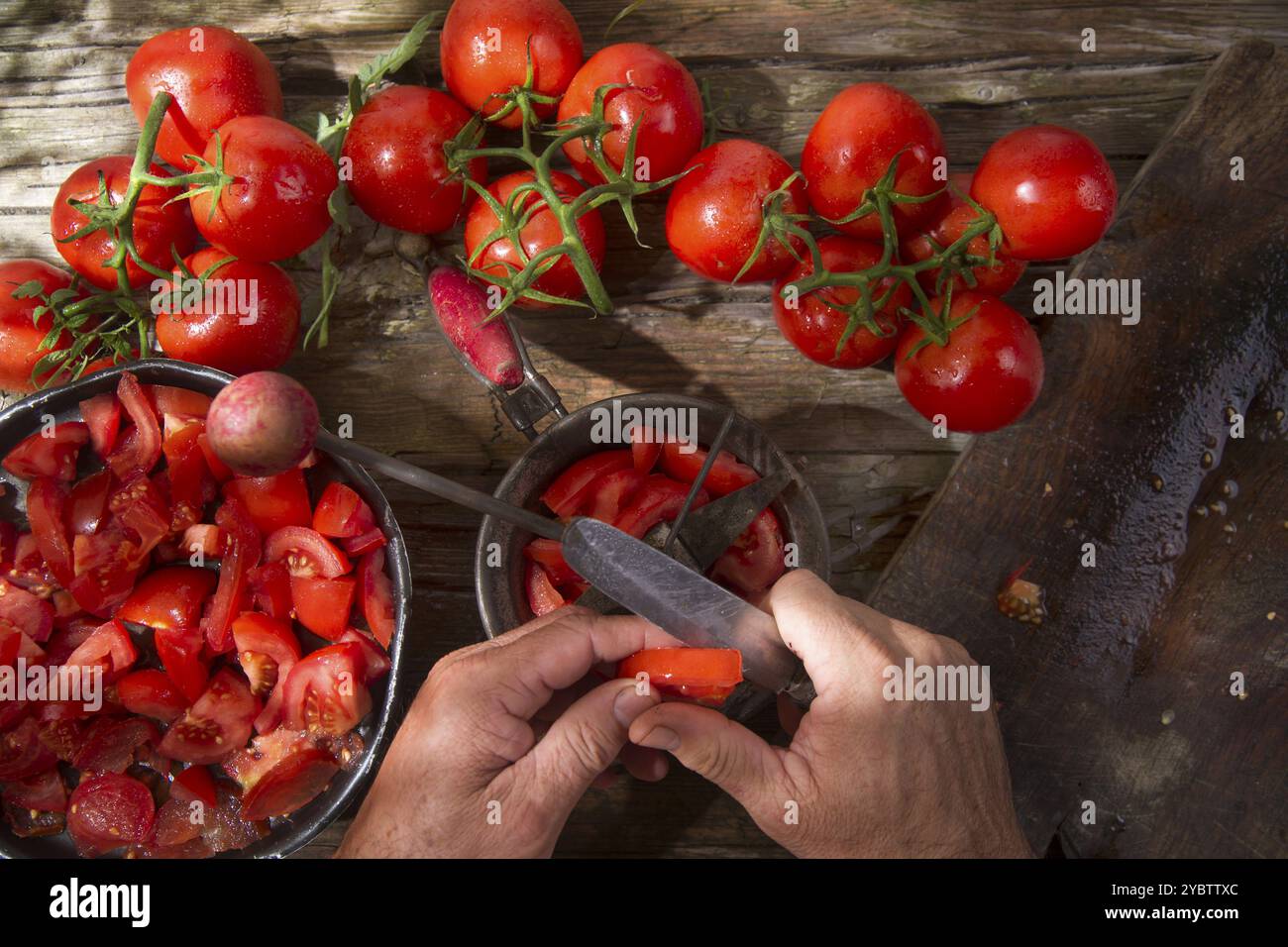 Preparation with strainer preserve fresh smooth round tomato Stock ...