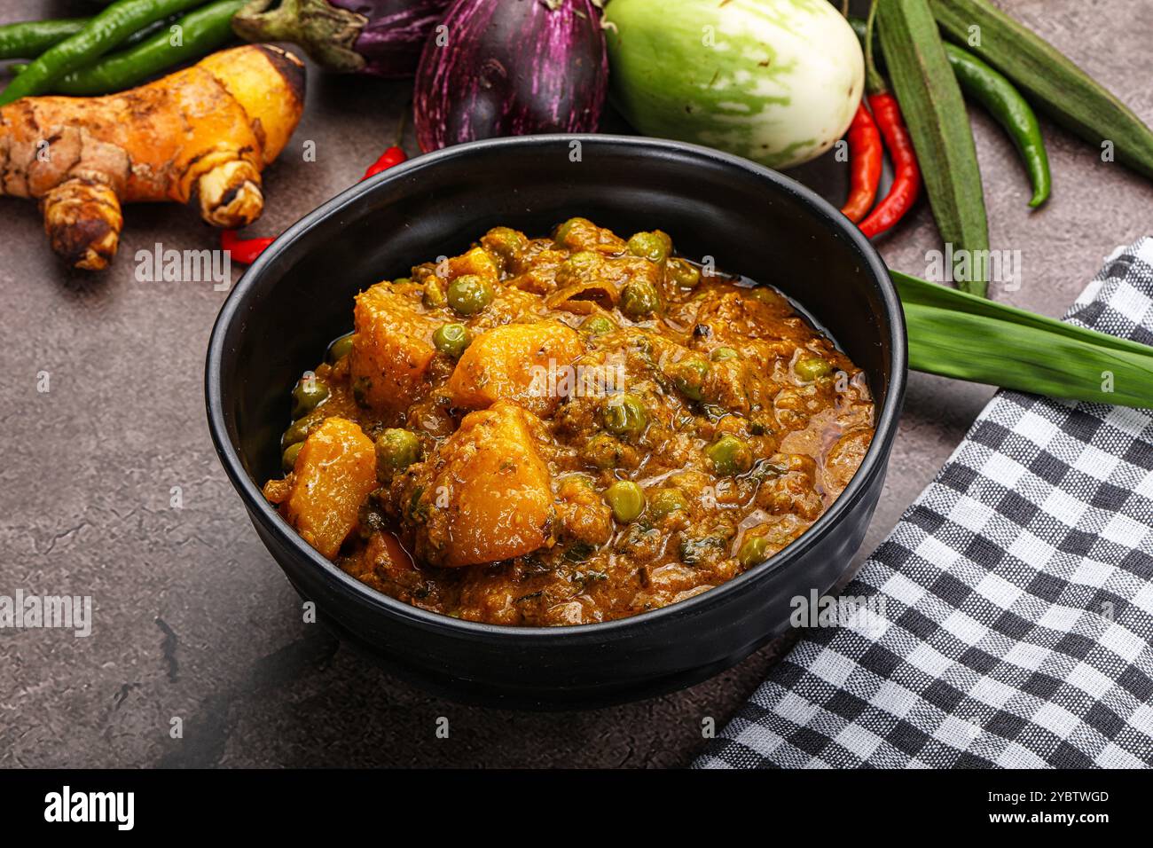 Indian traditional cuisine Aloo mutter - potato with green peas Stock ...