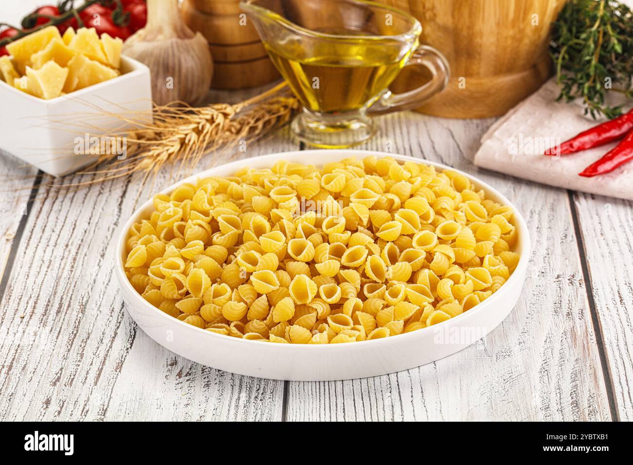 Italian cuisine - dry conchiglie shell pasta Stock Photo - Alamy
