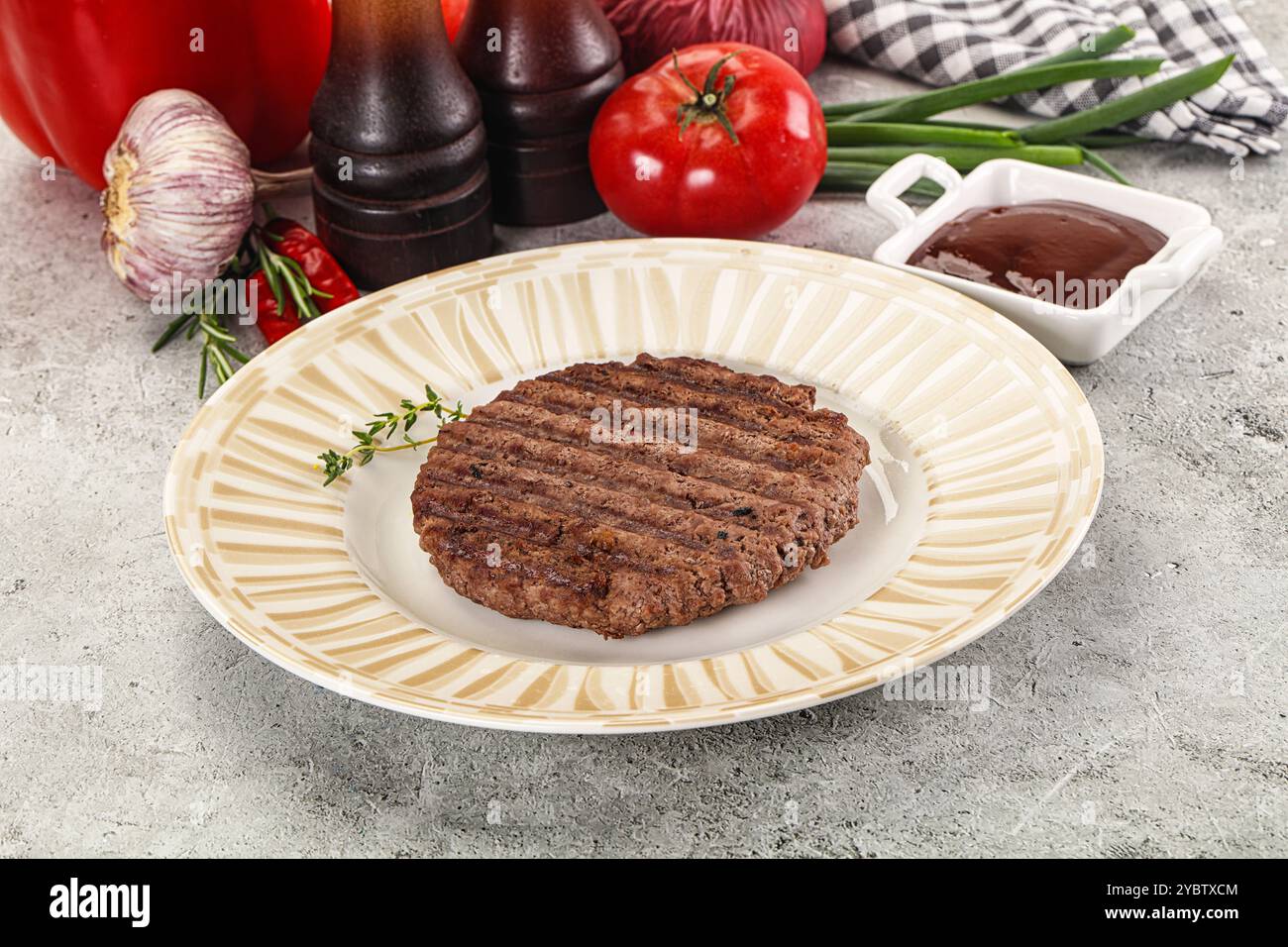 Grilled minced beef burger cutlet served thyme Stock Photo - Alamy