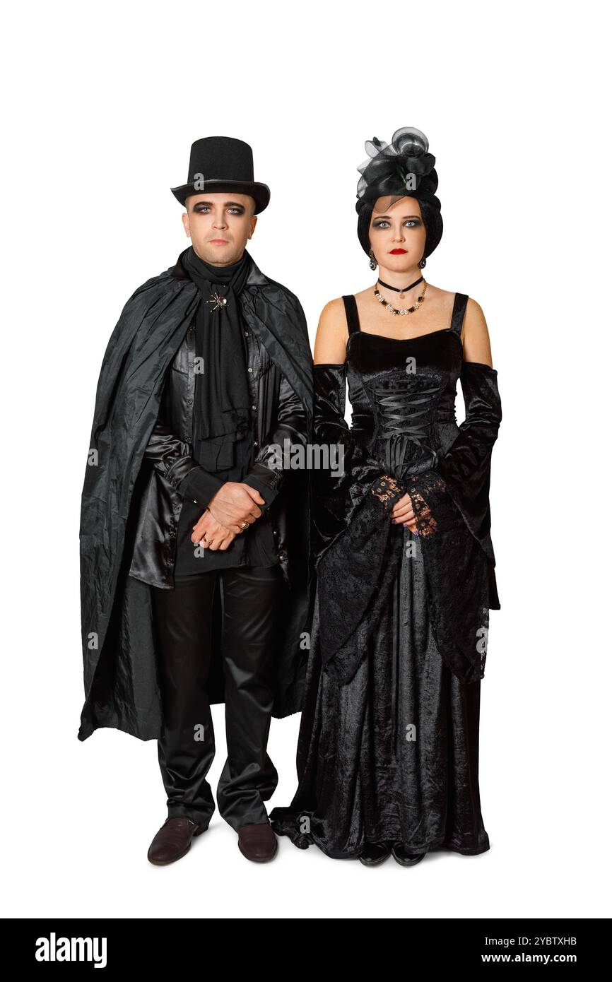 Portrait of cute couple dressed in vampire style clothes isolated on ...