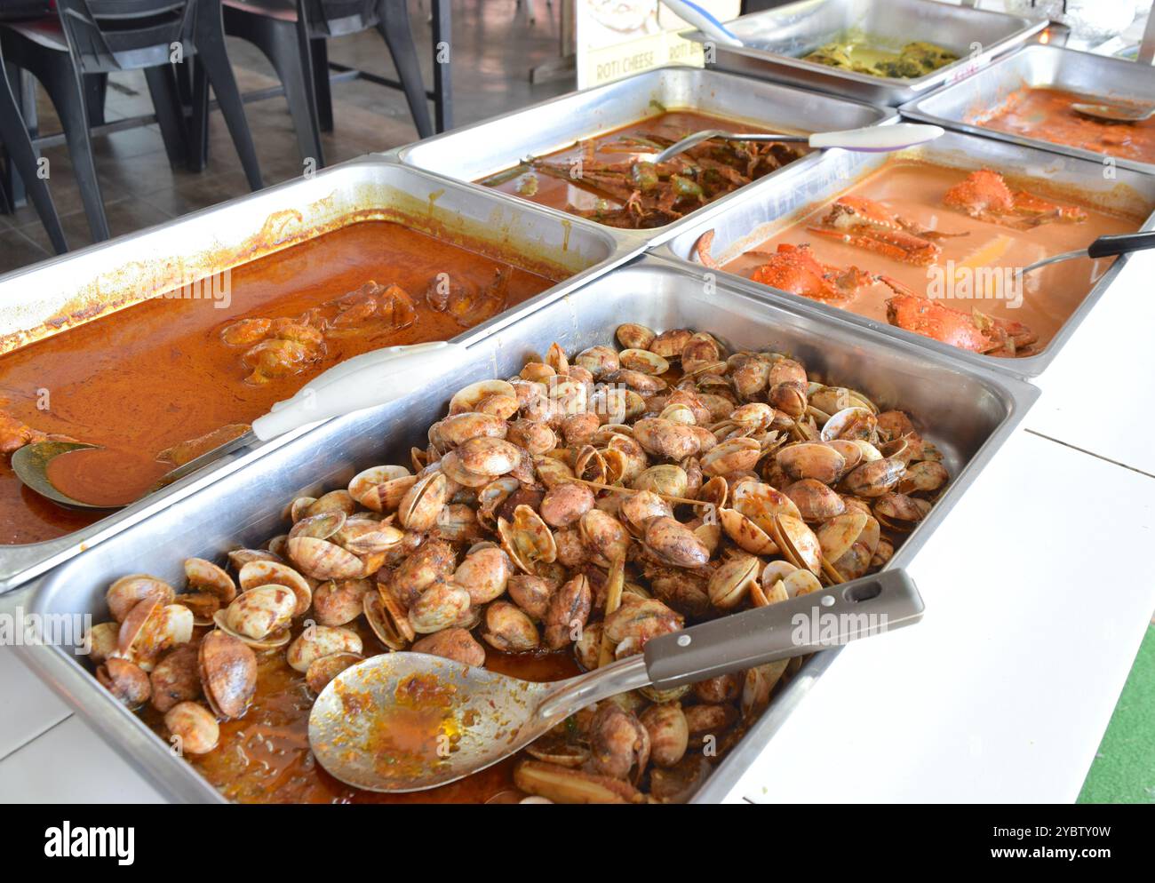Malaysian cooked food in trays in Langkaei beach cafe Stock Photo - Alamy