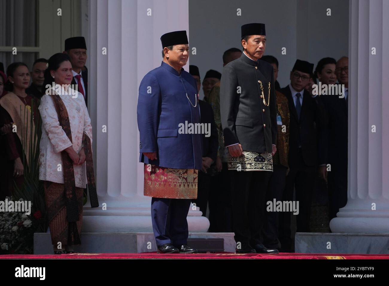Indonesia's newly-inaugurated President Prabowo Subianto, center ...