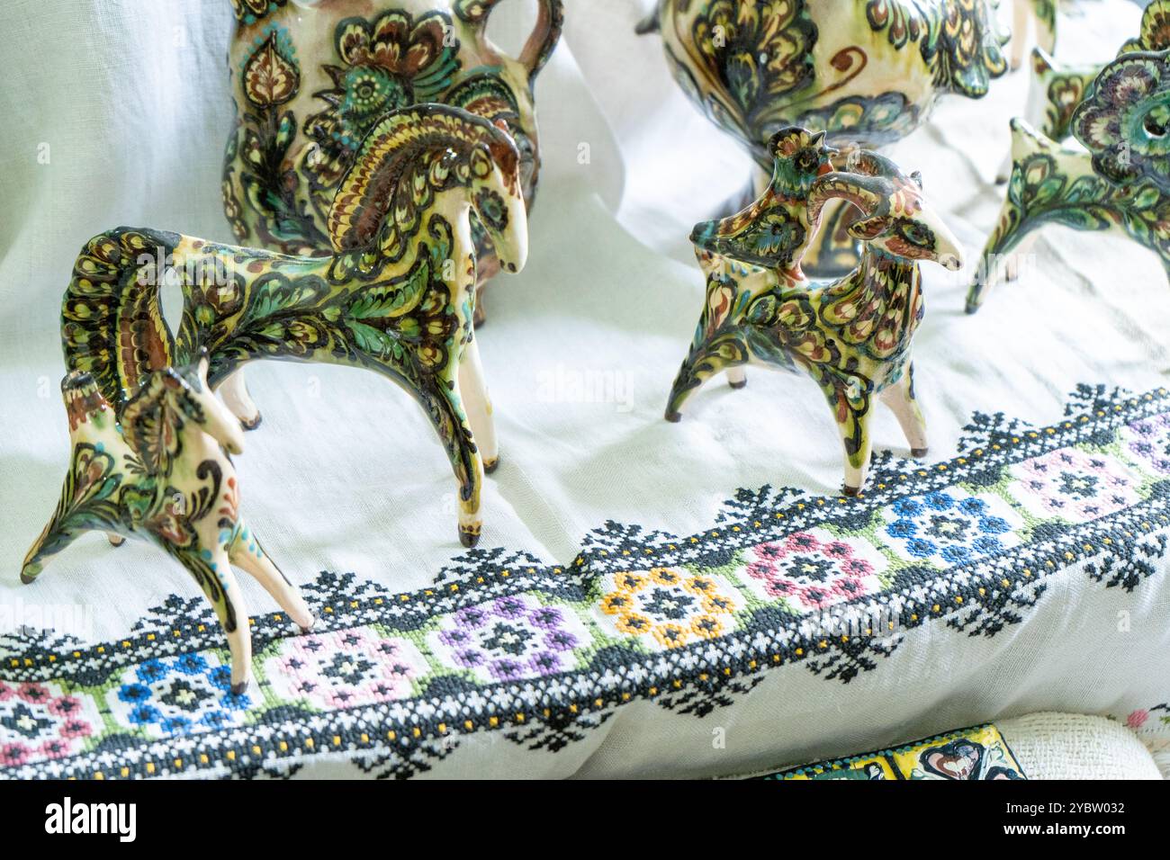 Clay whistle figurines in the shape of horse animals. Old Ukrainian ...