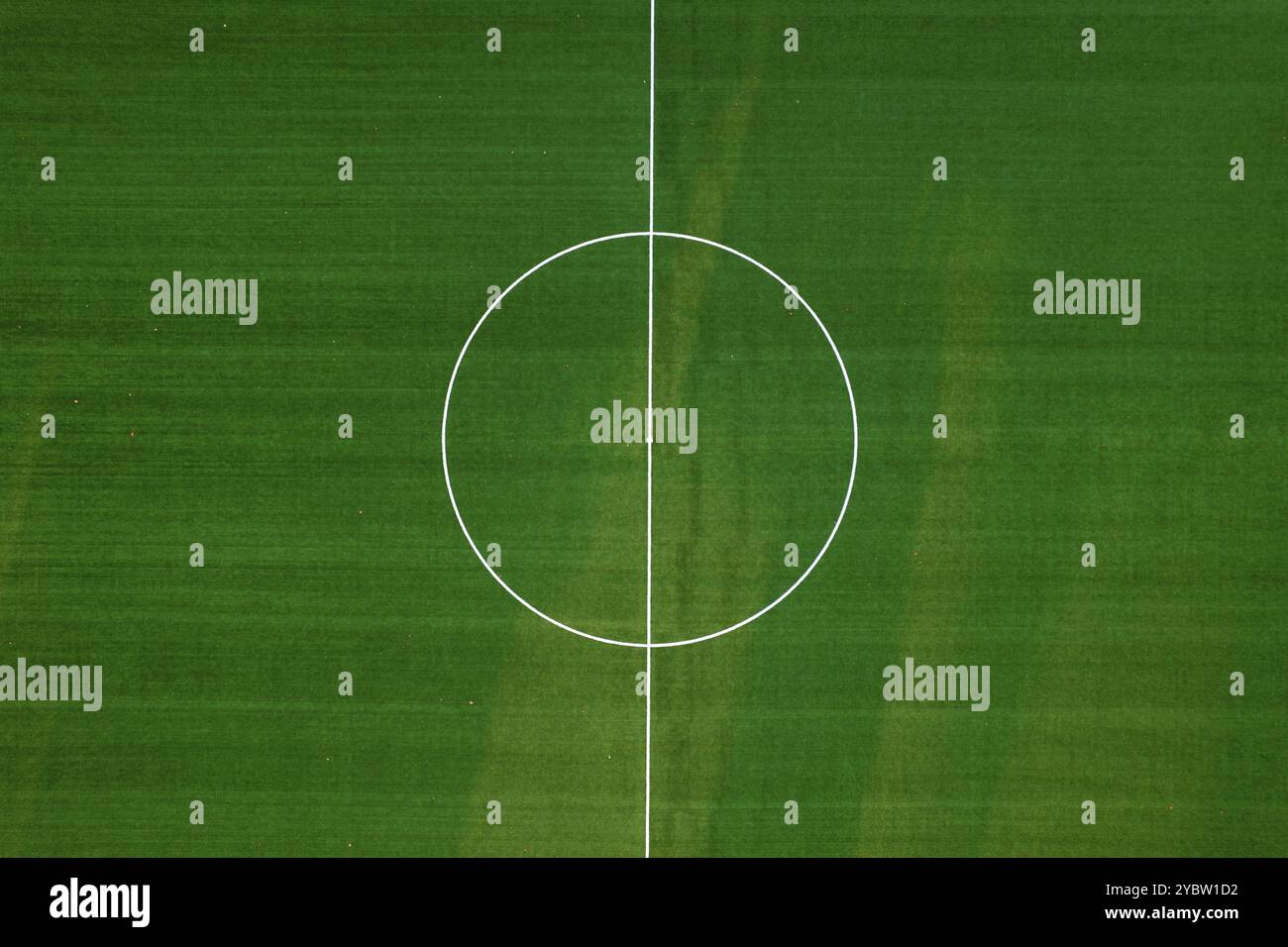 Aerial photographic documentation of an empty green football pitch ...