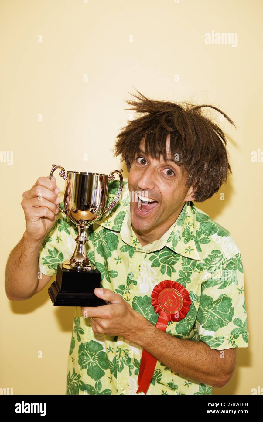 Happy individuals with trophies hi-res stock photography and images - Alamy
