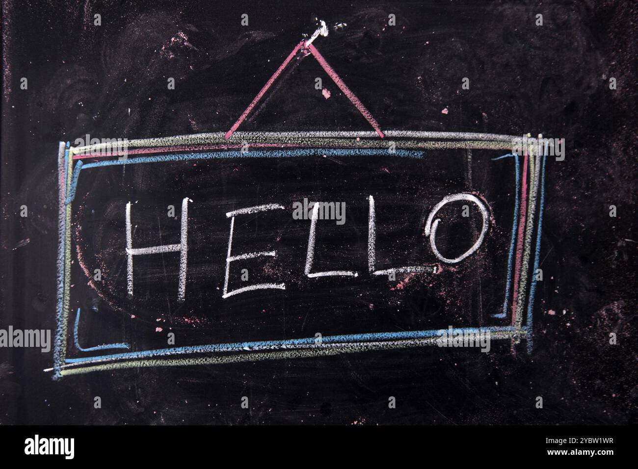 Representation of the writing, hello, made with chalk on blackboard ...