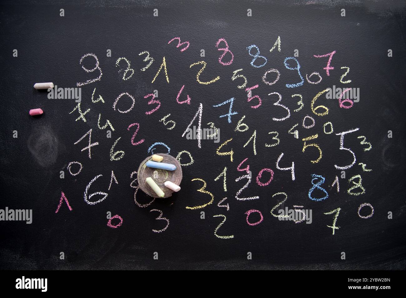 Graphic representation with chalk on blackboard with colorful numbers ...