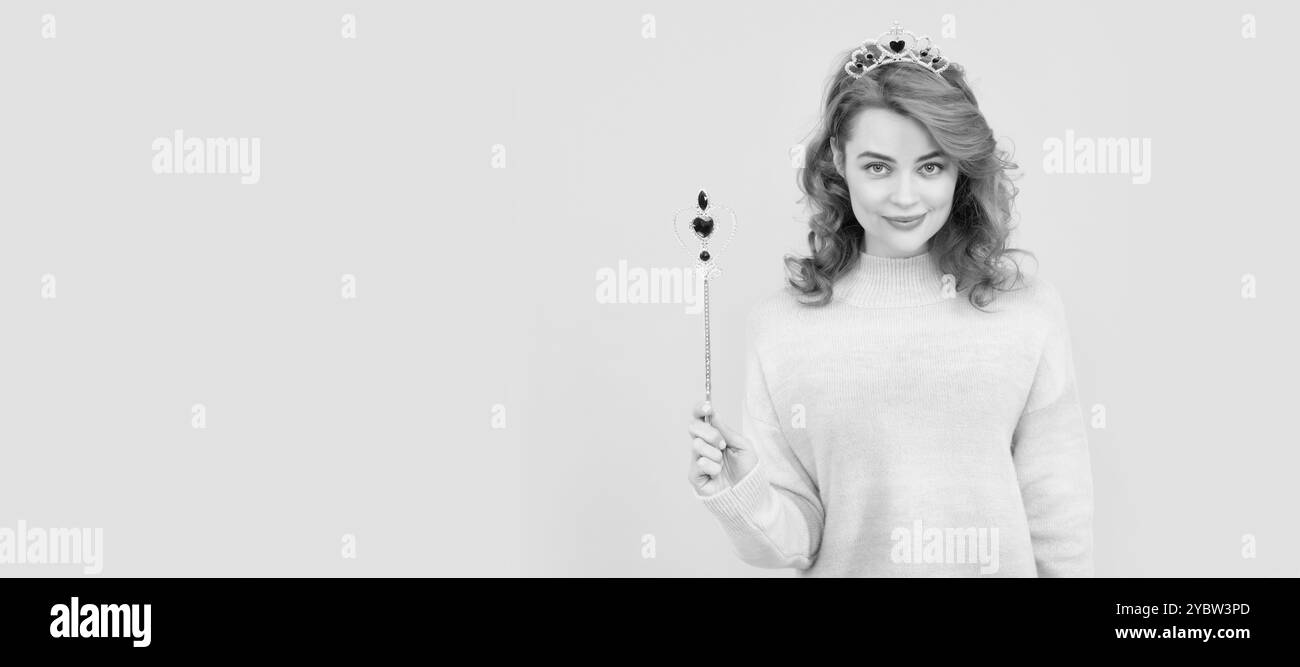 smiling redhead woman in queen crown with magic wand, wish. Woman ...