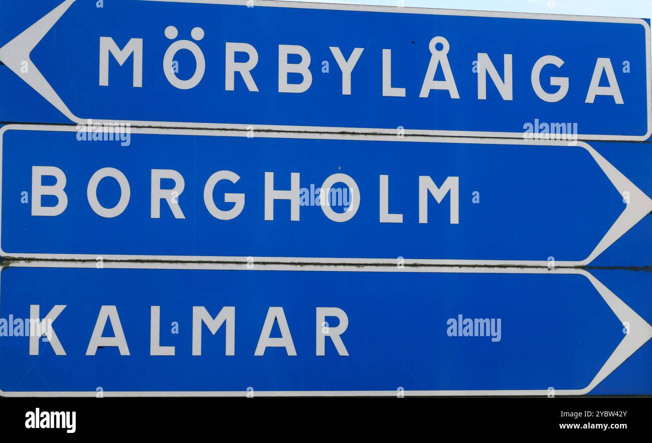 Sign post with directional road signs to the Swedish towns Morbylanga ...