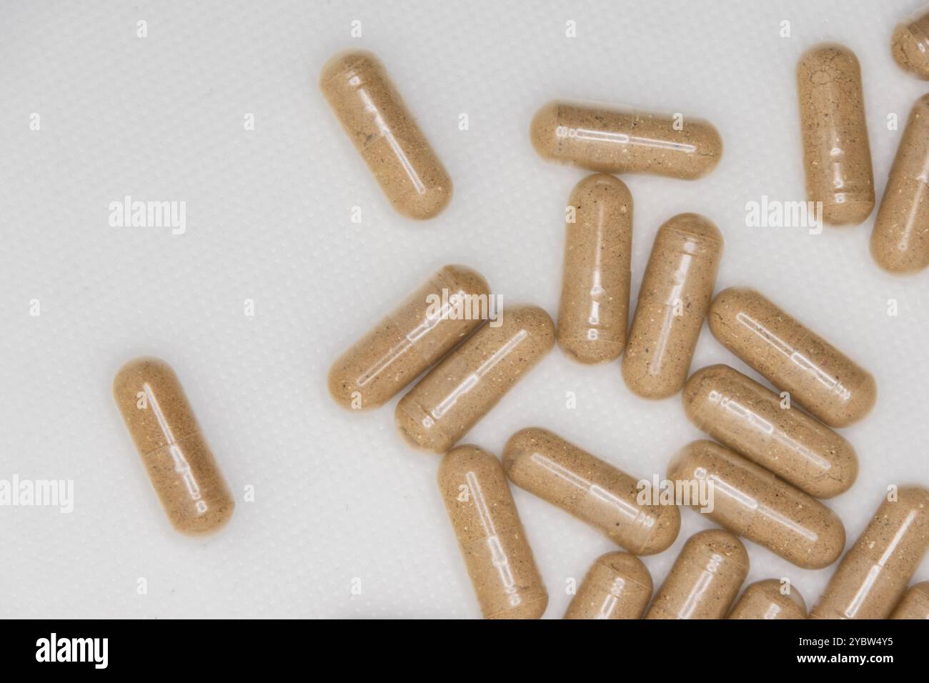 Spilling vitamin capsules from pill hi-res stock photography and images ...