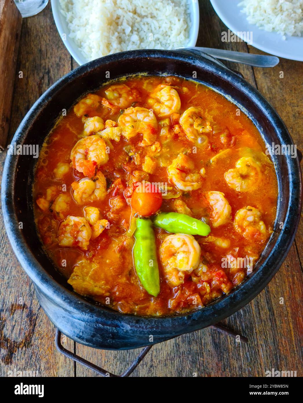 Moqueca, a traditional Brazilian dish with badejo fish and large shrimp ...