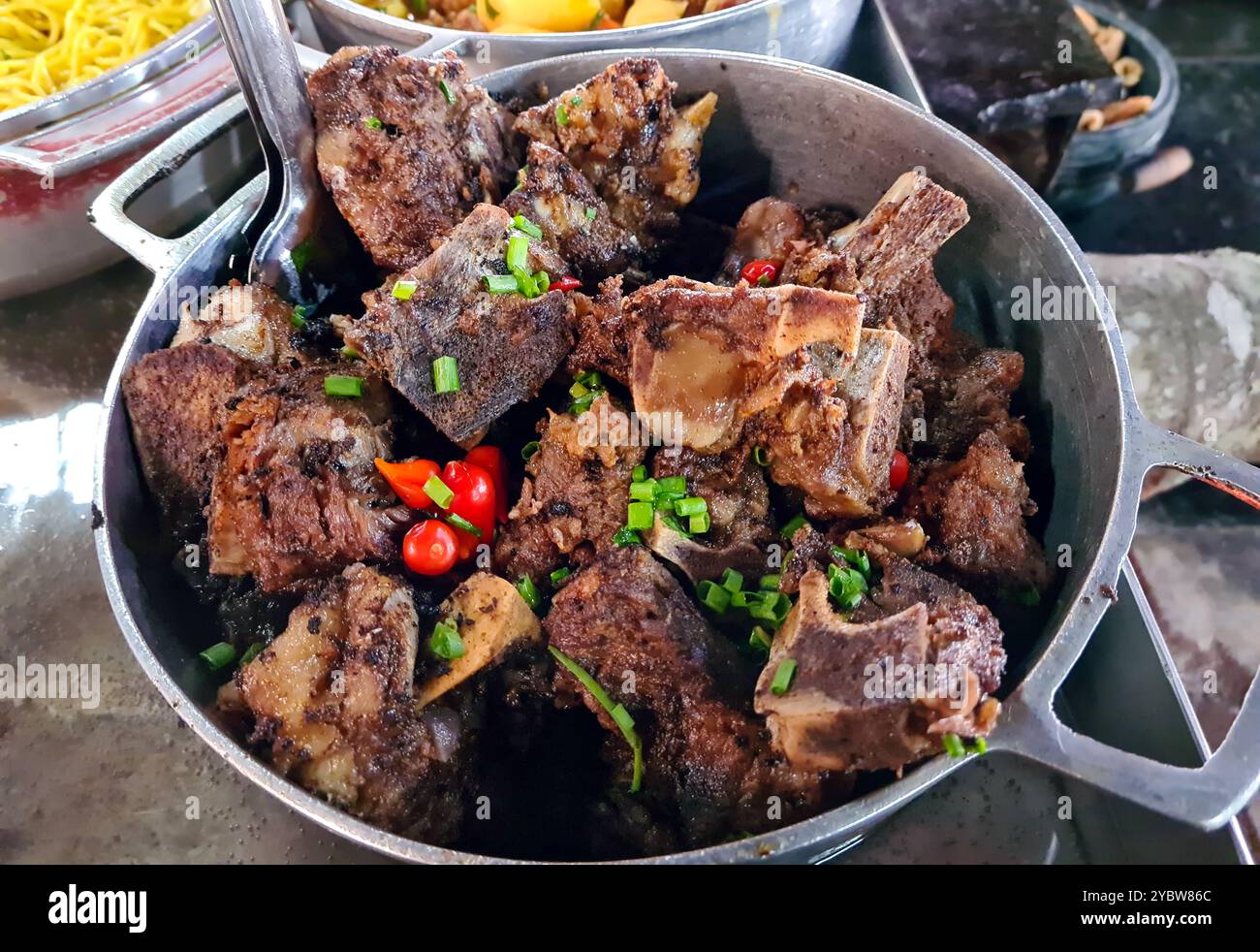 Beef ribs on a wood stove Stock Photo - Alamy