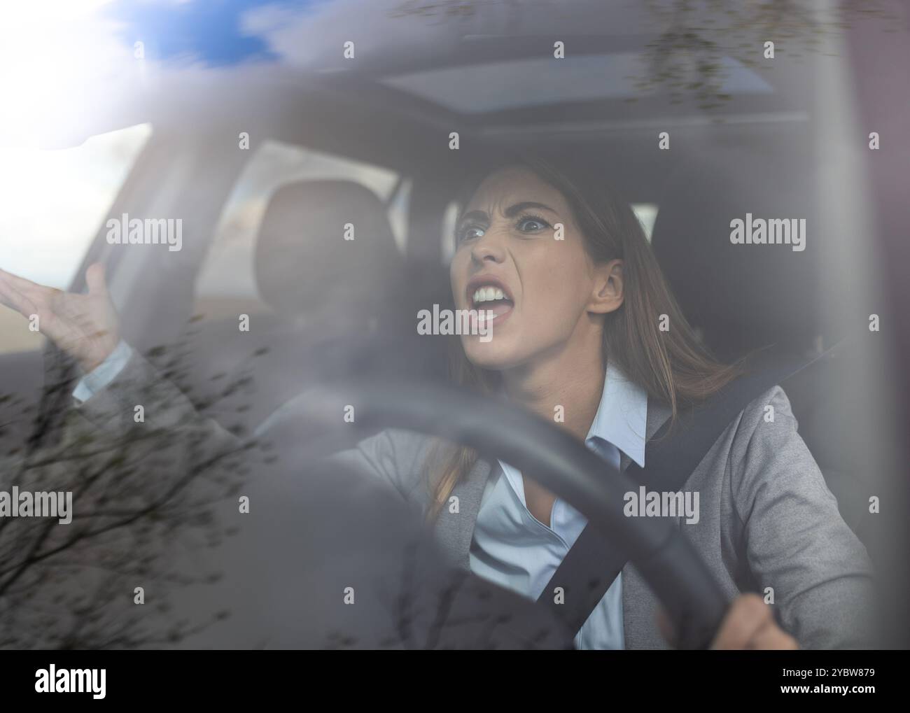 Woman yelling car window hi-res stock photography and images - Alamy