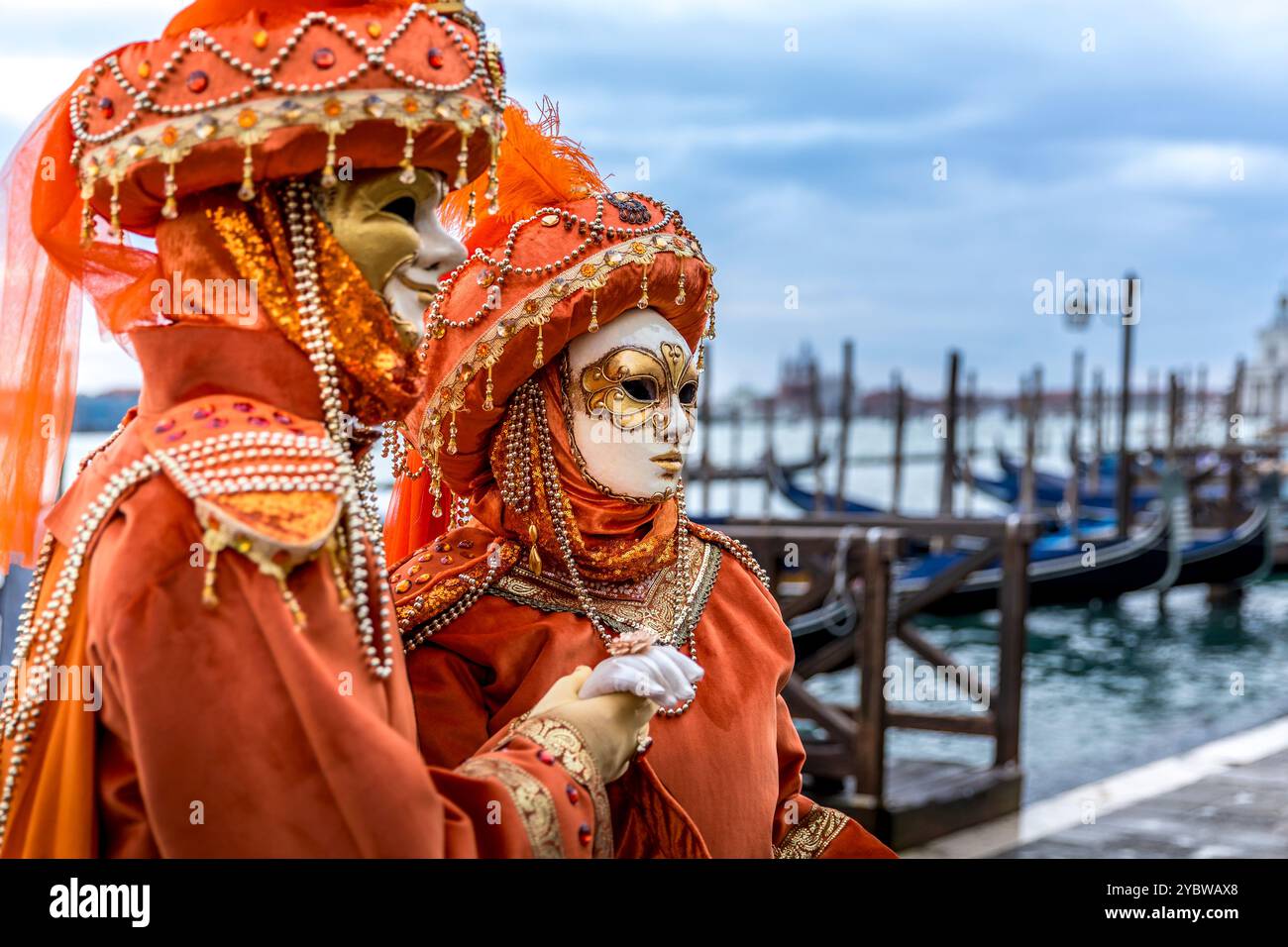 Venice, Italy - February 11, 2024: Pretty costumes worn by couple ...