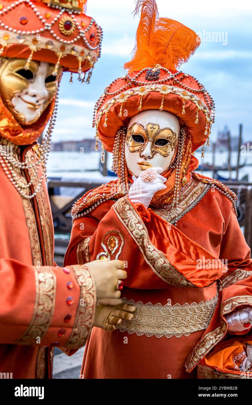 Venice, Italy - February 11, 2024: Pretty costumes worn by couple ...