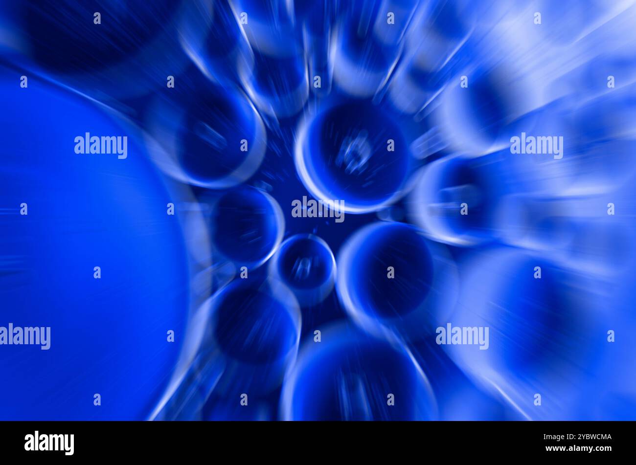 Zoom effect on closeup of bubbles on water surface water in blue ...