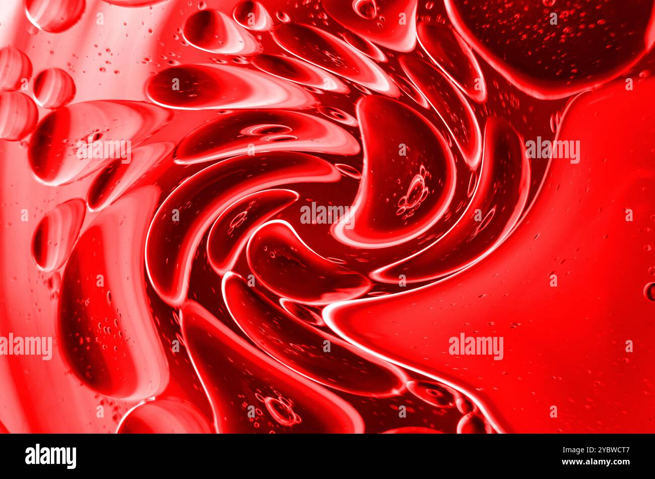 Twirling effect of bubbles on surface of water in dark red gradient ...