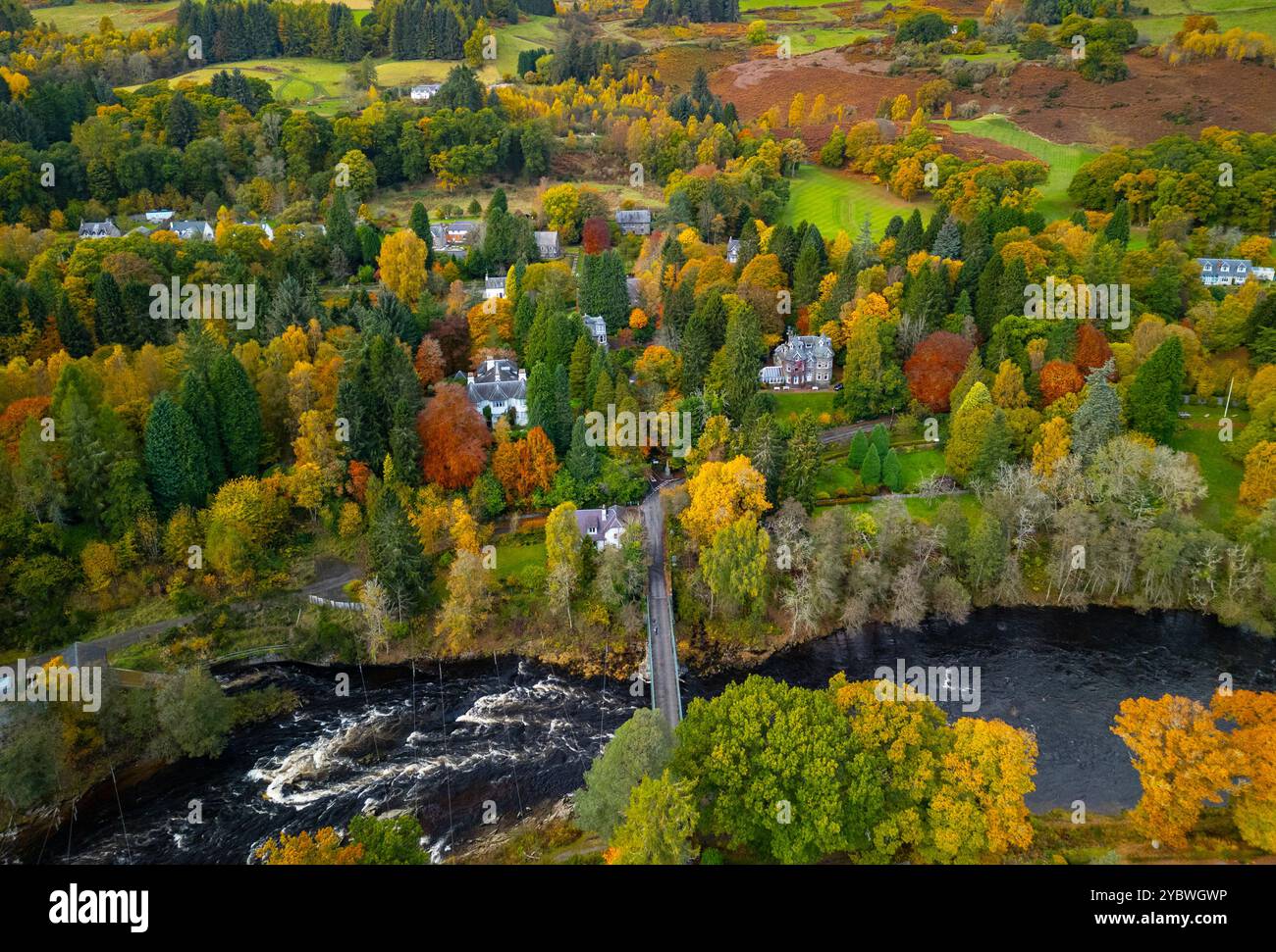 Aerial view from drone of River Tay in village of Strathtay in autumn ...