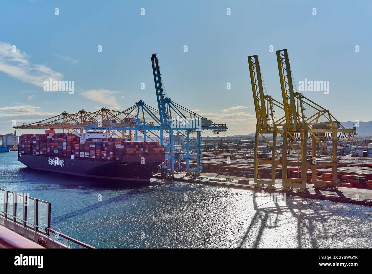 Barcelona. Espain -October 20,2024: View of the Barcelona port with a cargo ship docked and ...