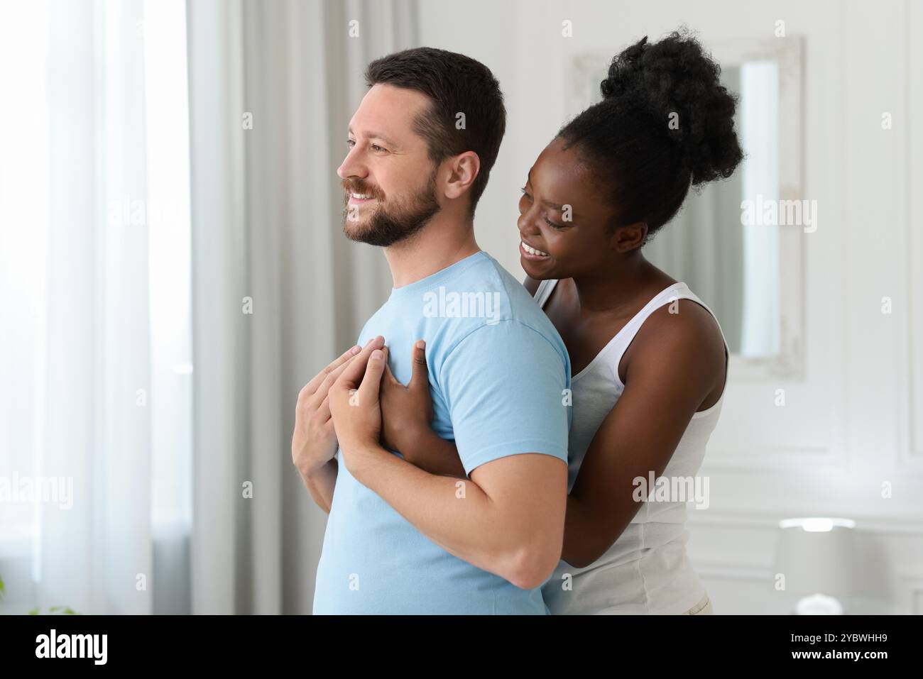 International relationships. Portrait of lovely couple at home Stock ...