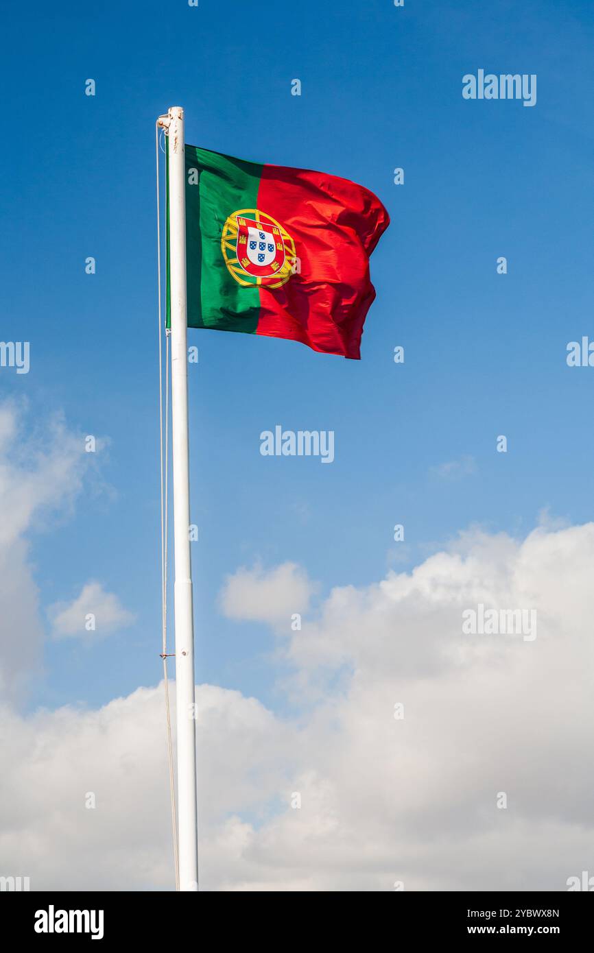 Portuguese flag flutters in wind hi-res stock photography and images ...