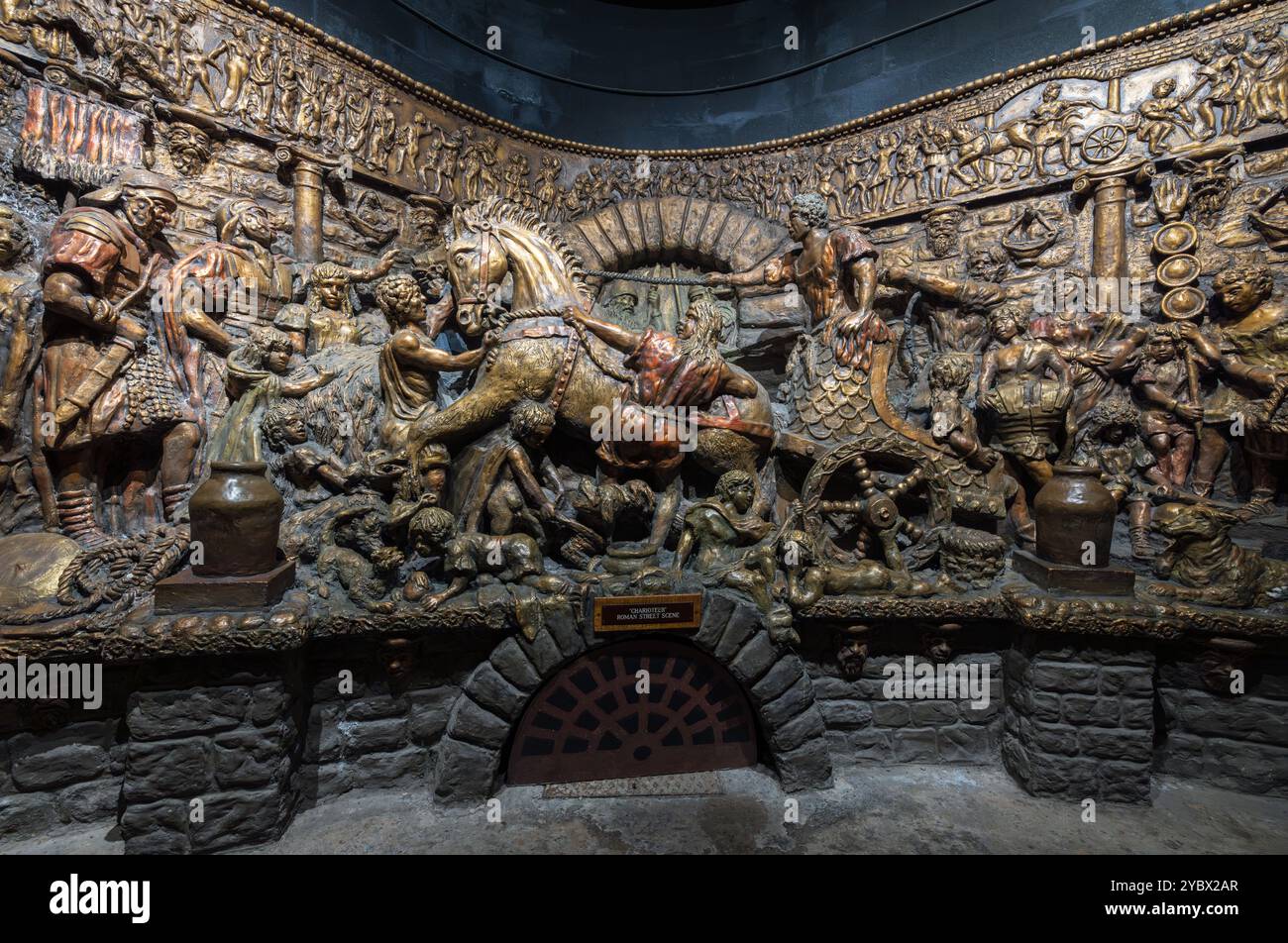 Sculptured mural by Frank Abraham depicts life before and during the ...