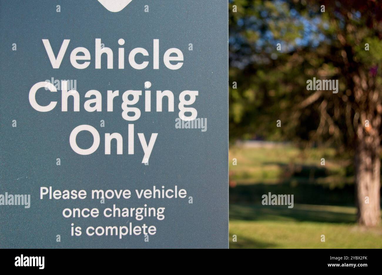 Charging station sign with copy space to the right Stock Photo - Alamy