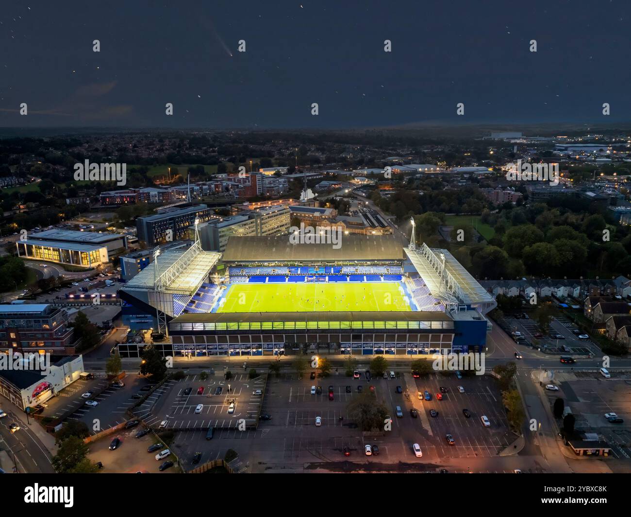 A comet in the night sky above the floodlights of Portman Road in ...