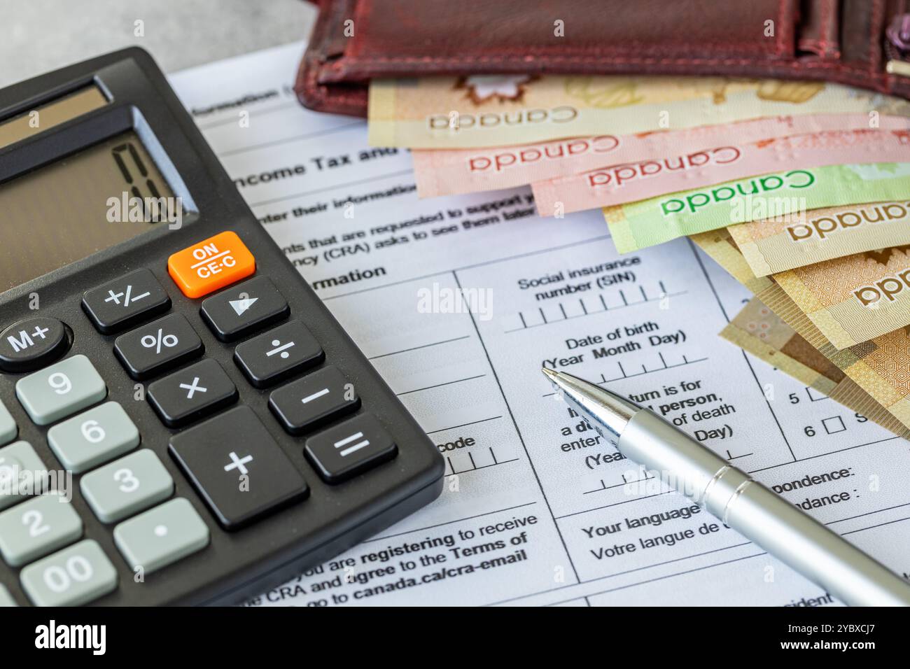 Income tax return in Canada. Financial concept. Tax form, Canadian ...