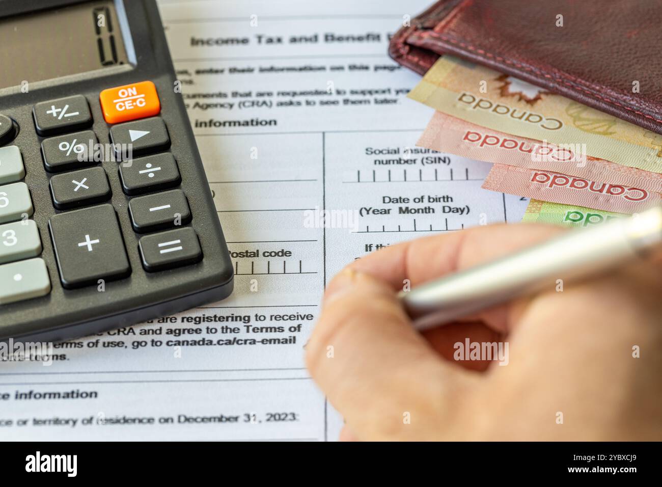 Income tax return in Canada. Financial concept. Tax form, Canadian ...