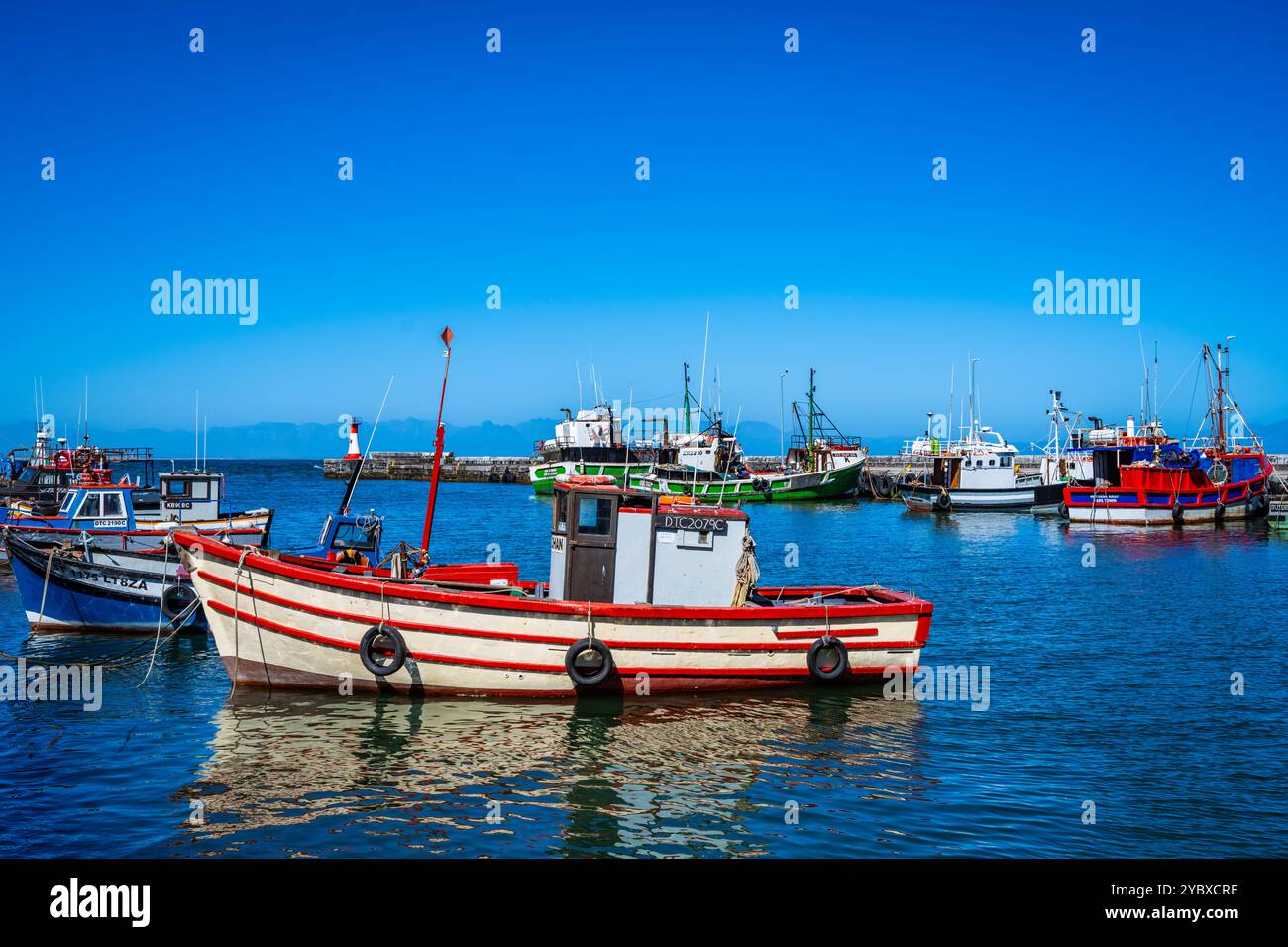 Harbor with colorful fishing boats Stock Photo - Alamy