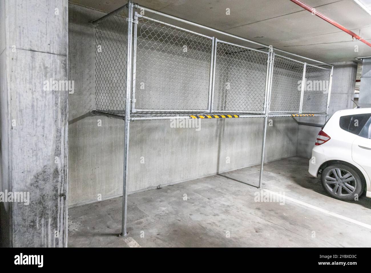Over bonnet storage concept in Australia apartment underground car park ...