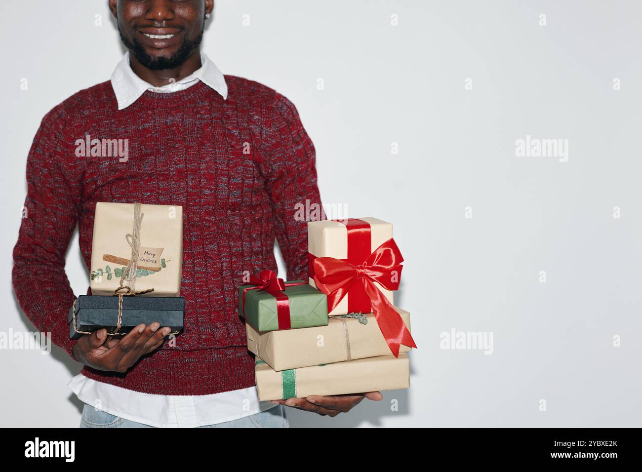 African american man holding gift hi-res stock photography and images ...