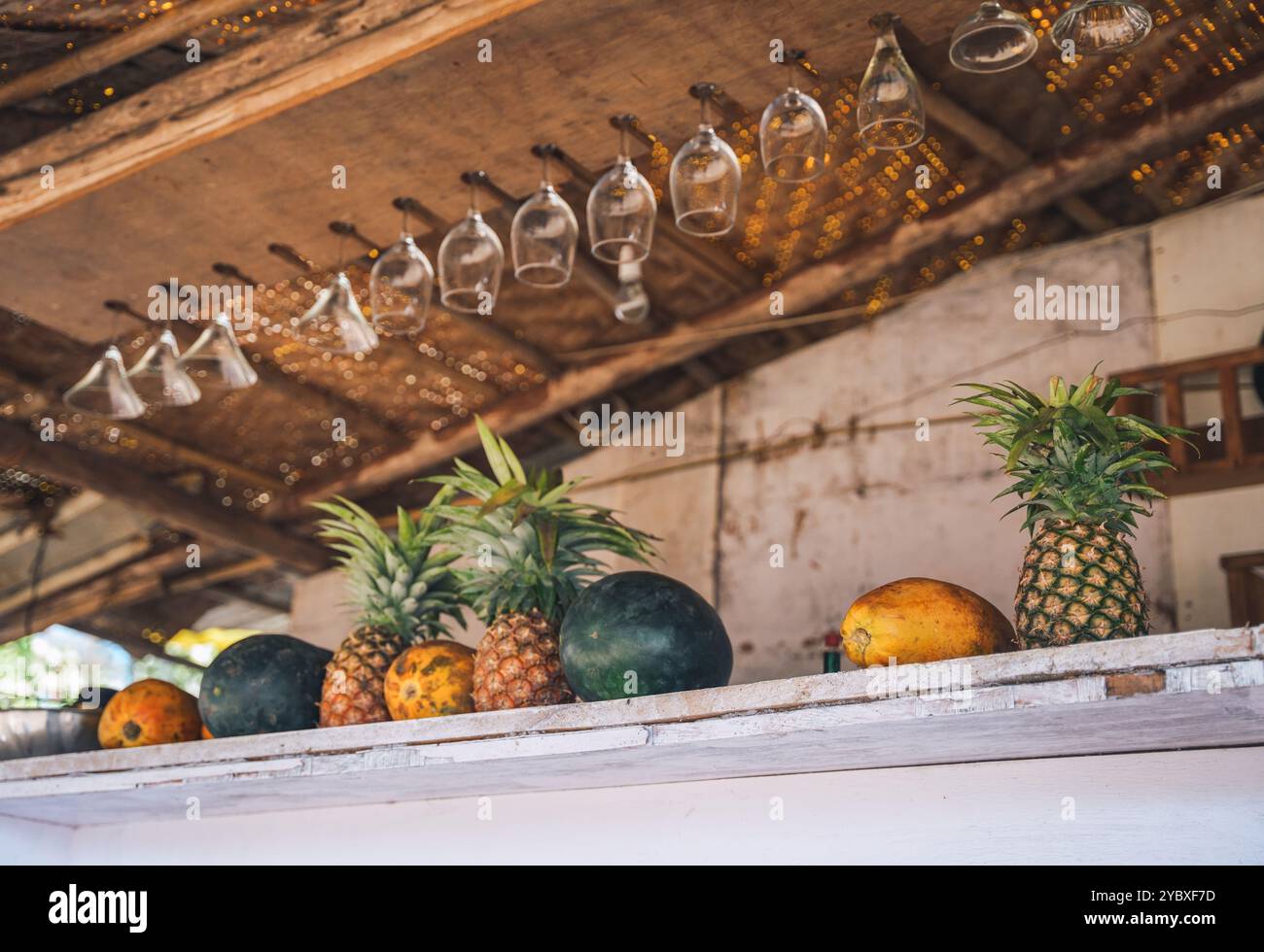 Pineapple and papaya are on the bar counter. Fruit cocktail Stock Photo ...