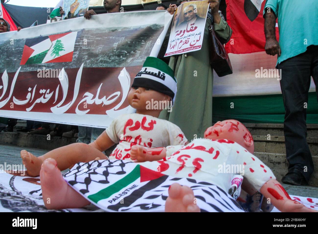 Tunis, Tunisia. 20 October 2024. Baby dolls with red stains are ...