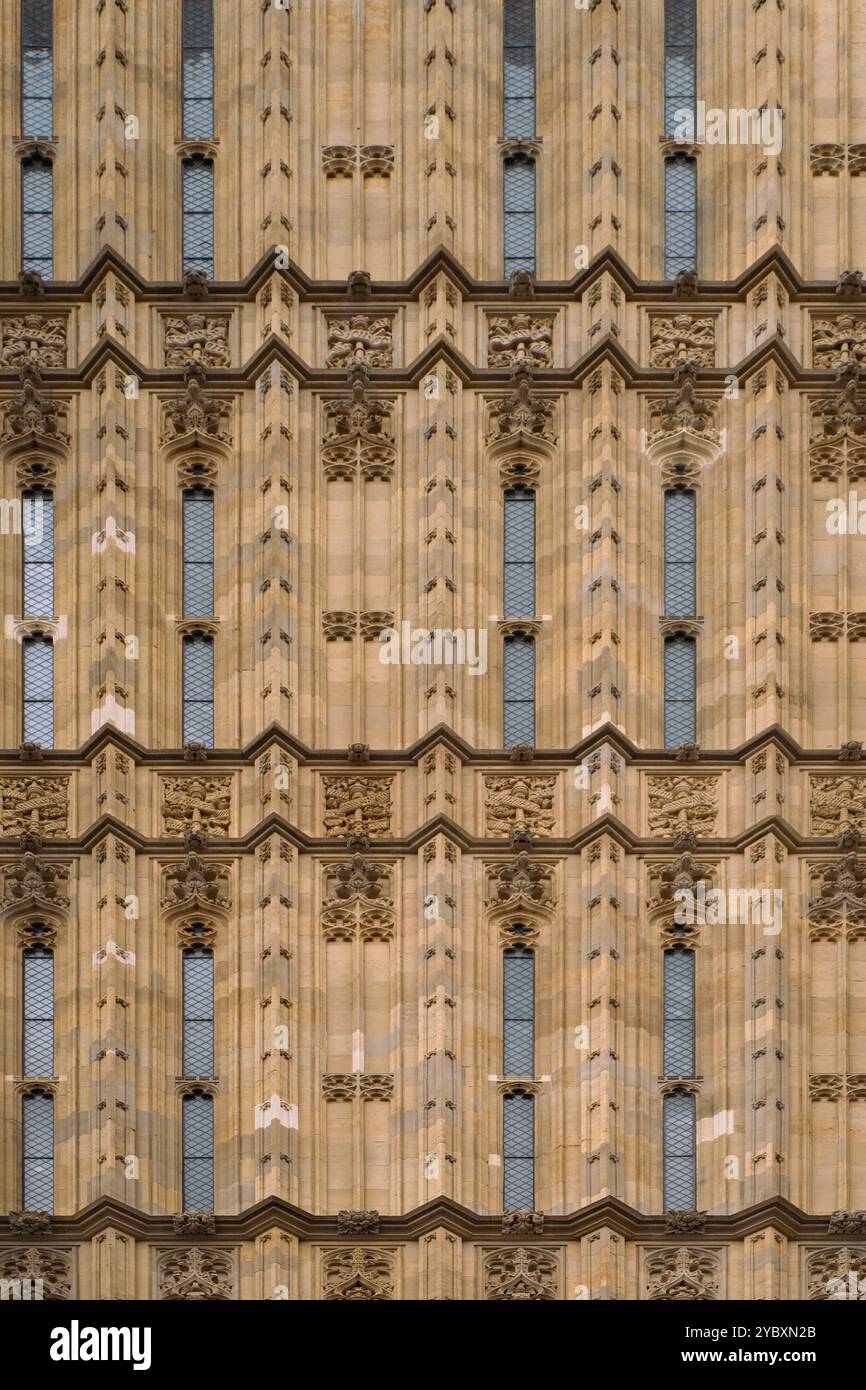 Ornate Gothic Facade with Vertical Windows and Intricate Carvings Stock ...