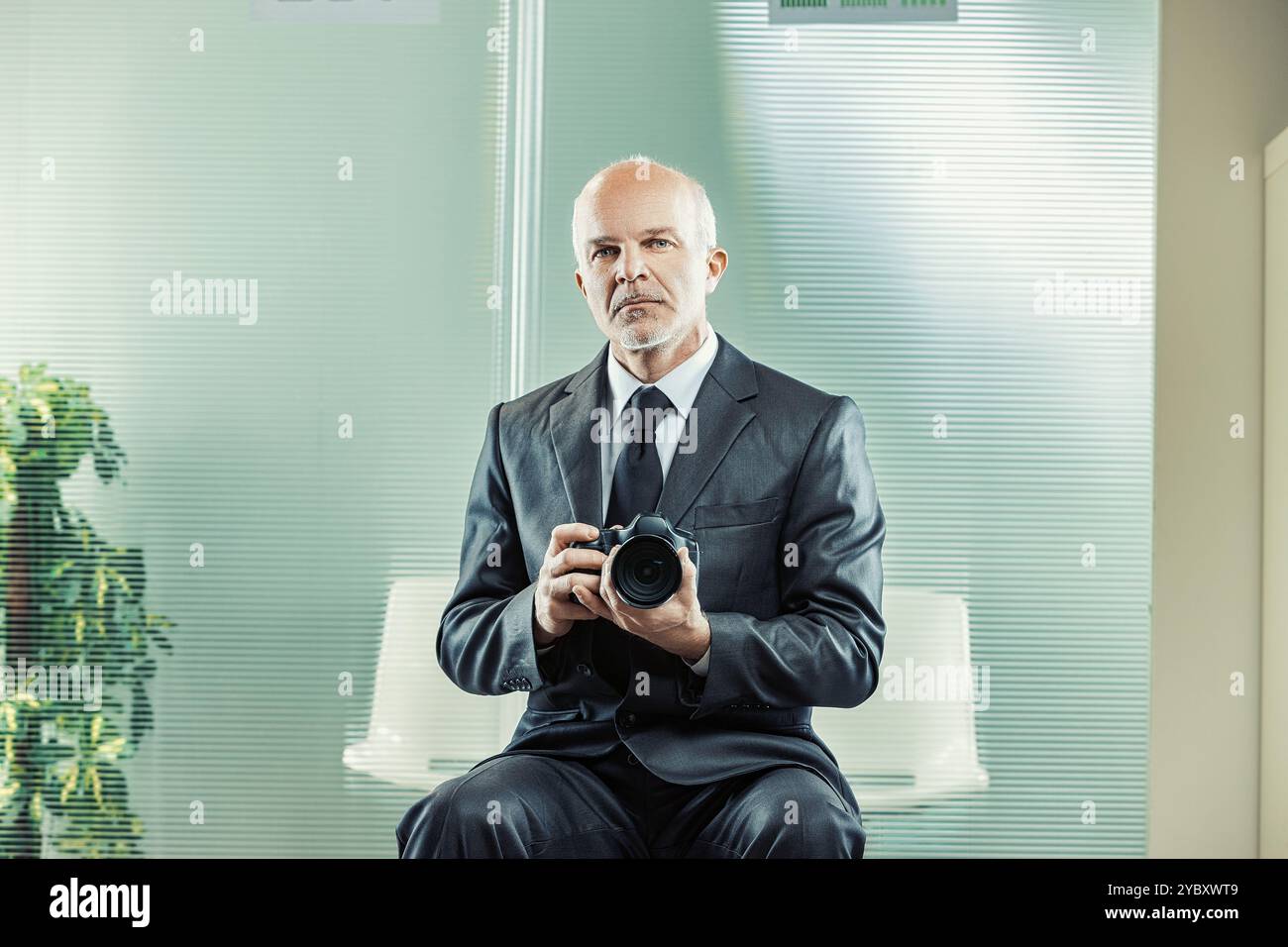 Gazing professional in suit hi-res stock photography and images - Alamy