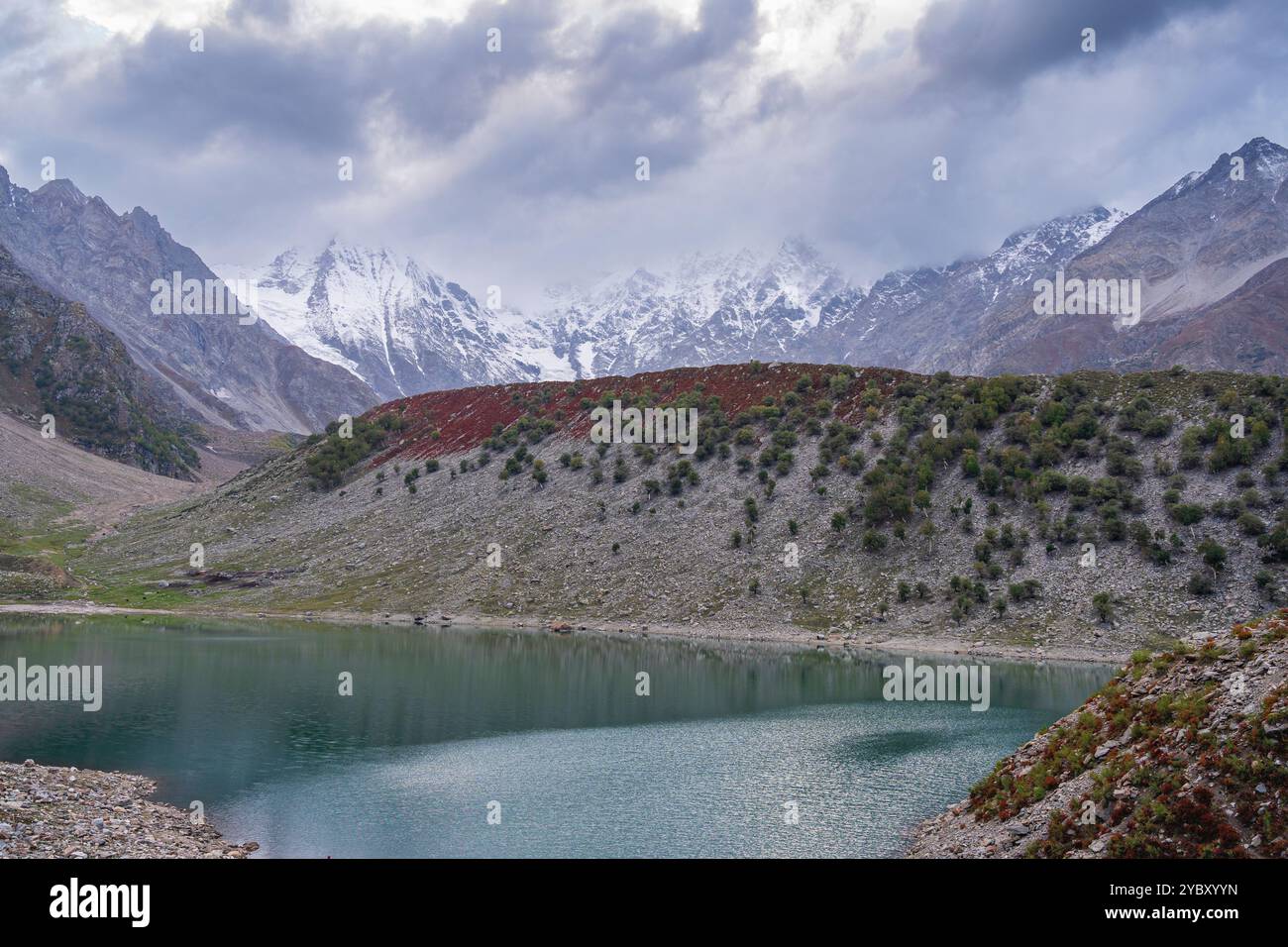 Scenic landscape view of Rama lake with Chongra peak in background on ...