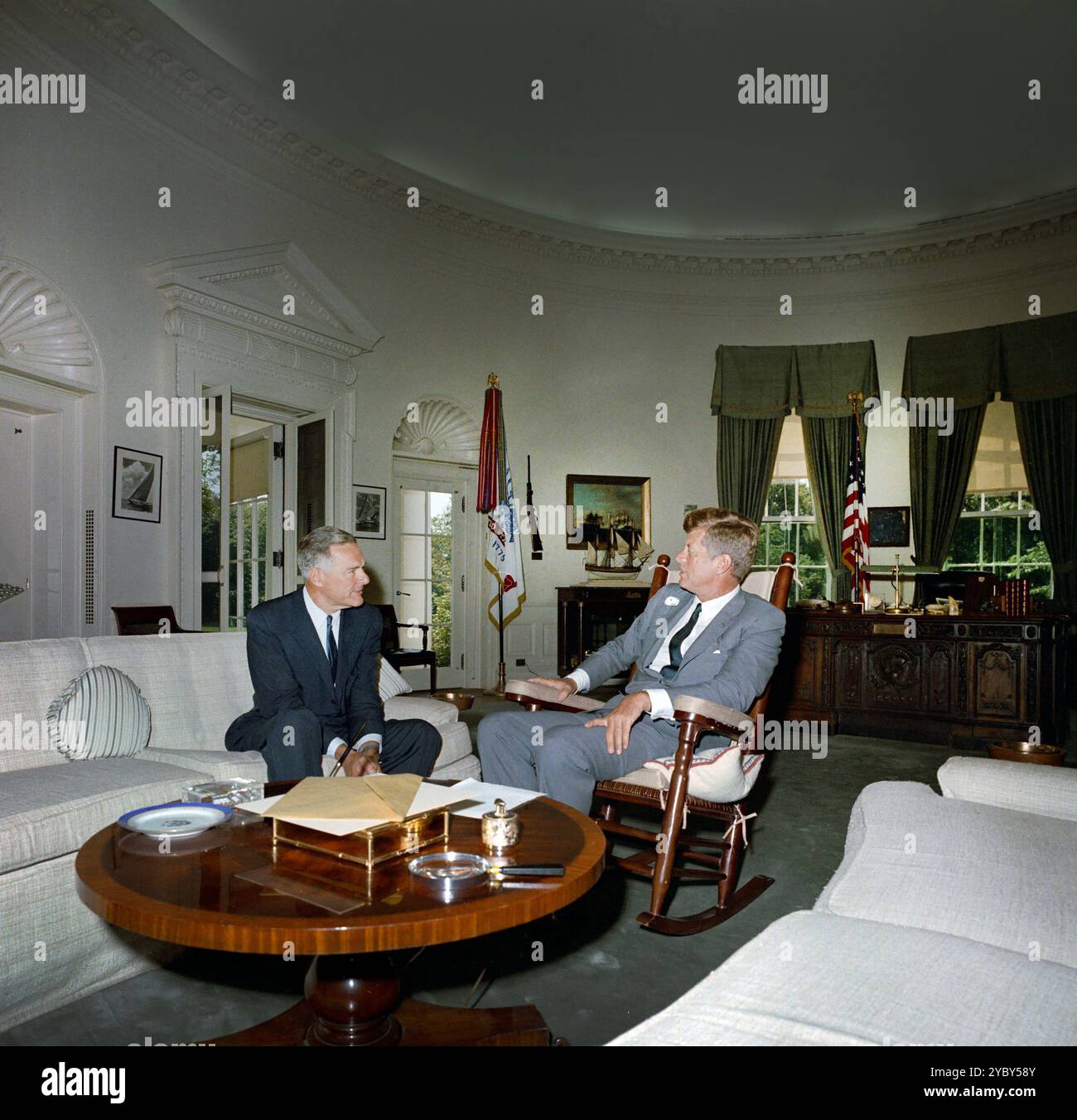 U.S. President John F. Kennedy (in rocking chair) meeting with newly ...