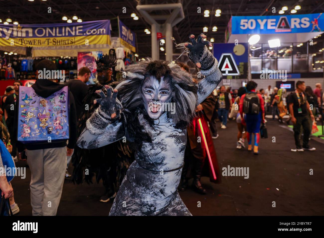 New York, United States. 19th Oct, 2024. A cosplayer poses for a photo ...