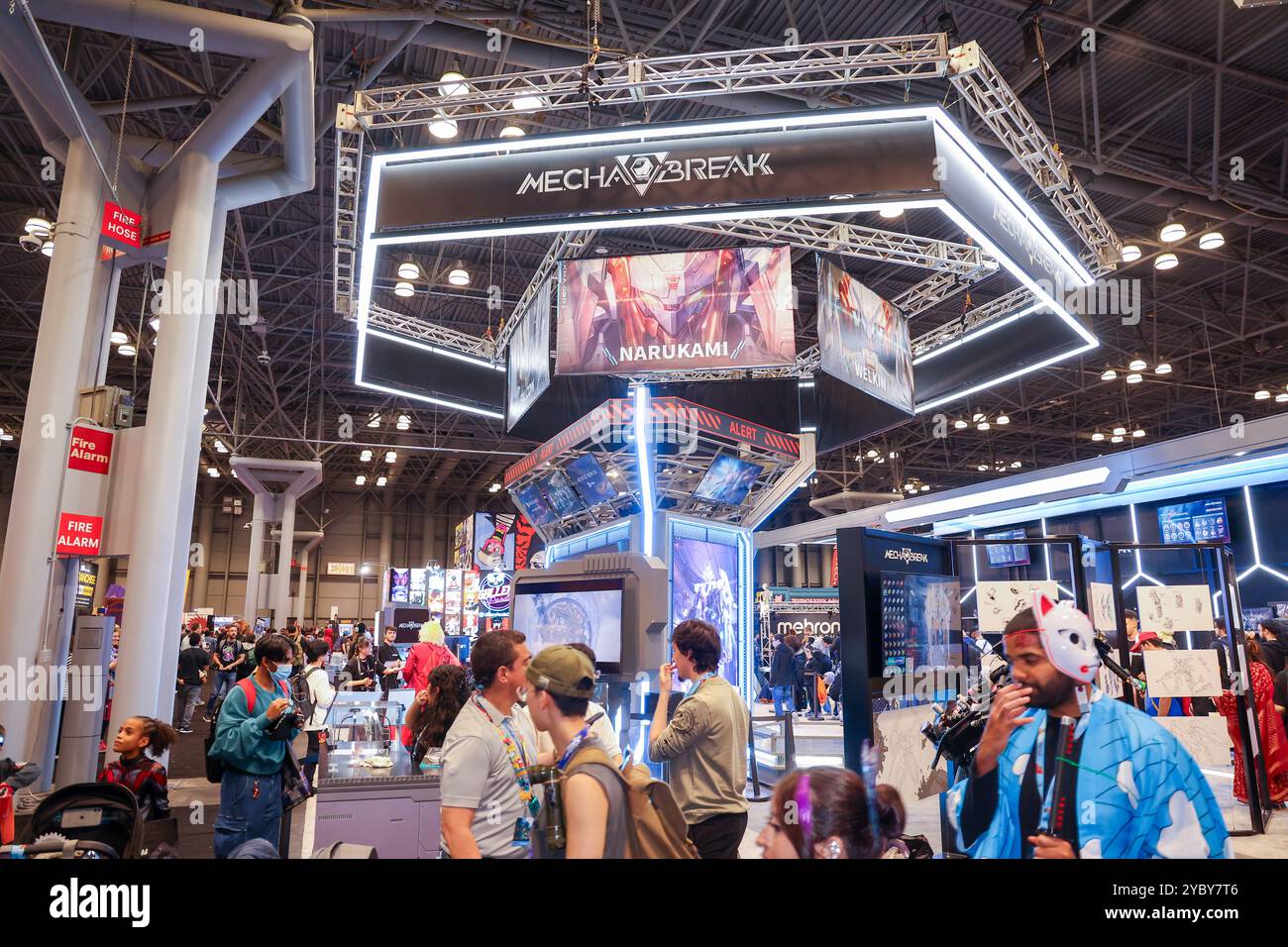 People attend the New York Comic Con 2024 at the Jacob Javits Center in ...