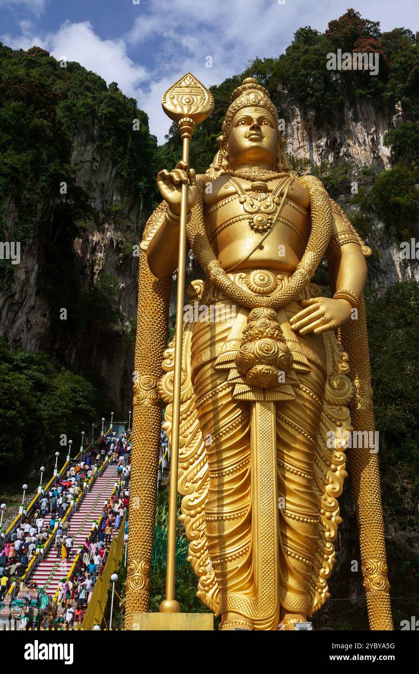 Batu Caves is a mogote with a series of limestone caves in Malaysia ...